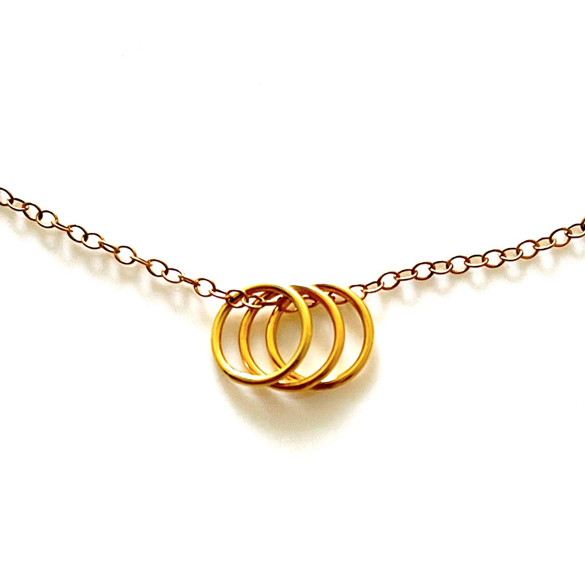 Elevate Your Connection with Our Gold-Plated Triple Unity Karma Pendant ...